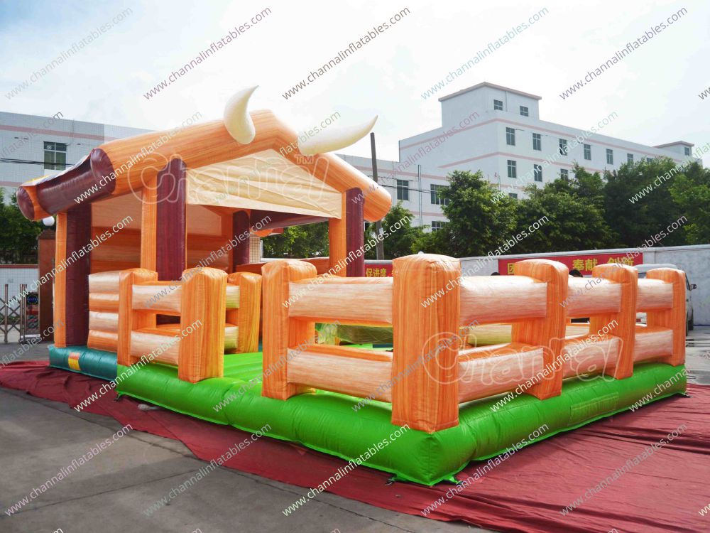 Blow Up Bull Riding Bounce House - Channal Inflatables