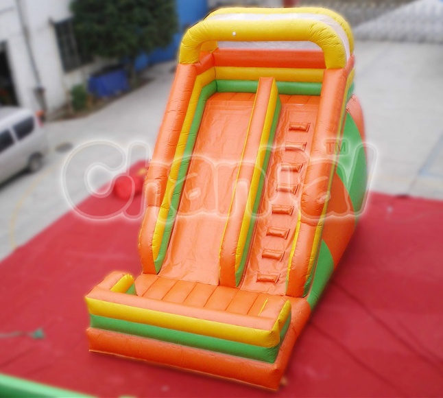 20'H Orange Inflatable Slide - Channal Inflatables